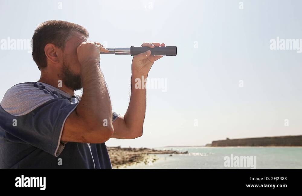 Man looking through spyglass Stock Videos & Footage - HD and 4K Video ...