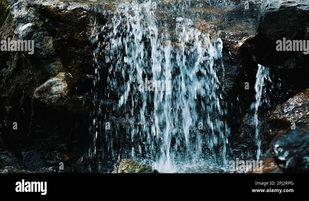 Water splashing from a small waterfall Stock Videos & Footage - HD and ...