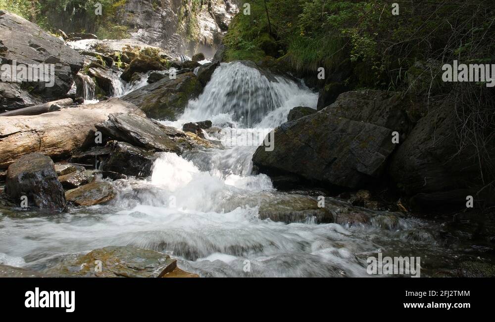 Cascade waterfall. Streams of water among huge boulders. Clean, clear ...