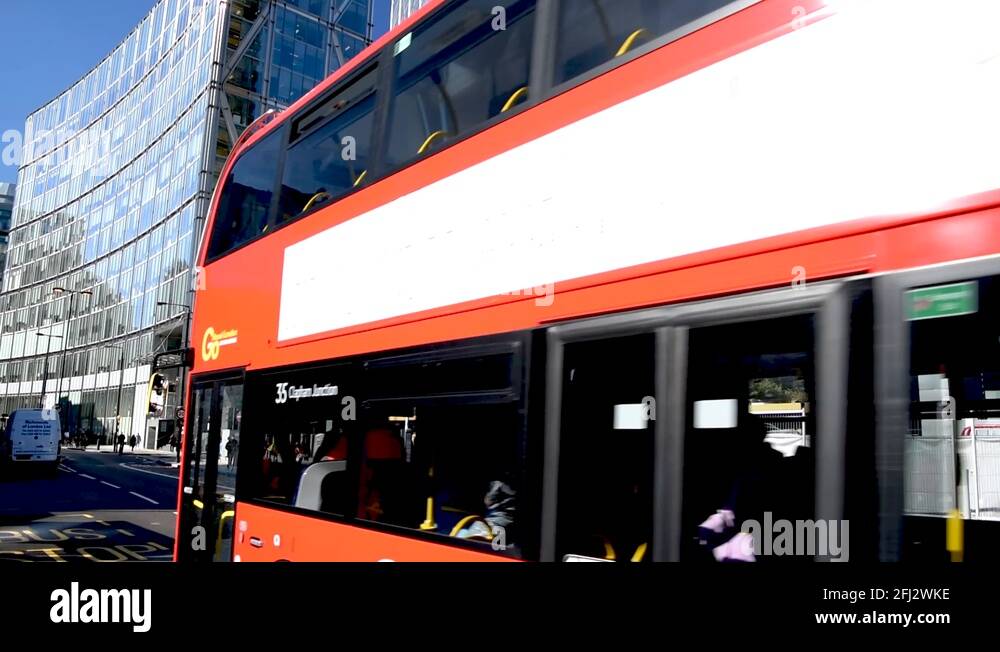 London Bus Moving Across Modern Skyscrapers in Shoreditch Stock Video ...