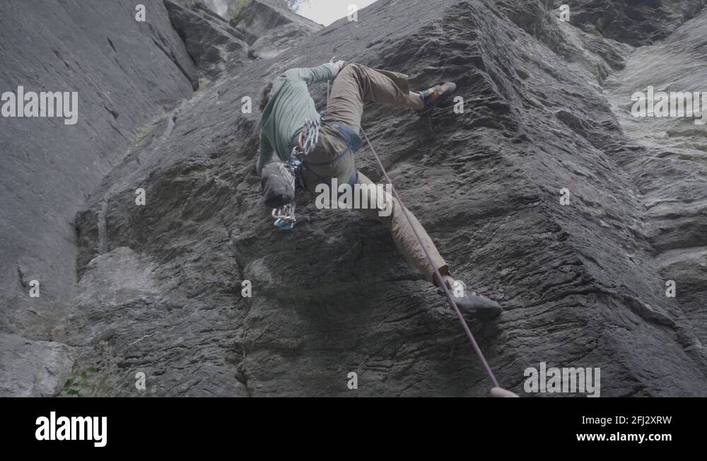 Man rock climbing people climbing cliff face Stock Videos & Footage ...