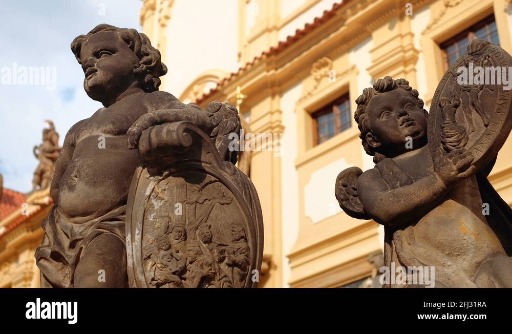 Prague -Sculptures of angels at Prague Loreto. 4K resolution trucking ...