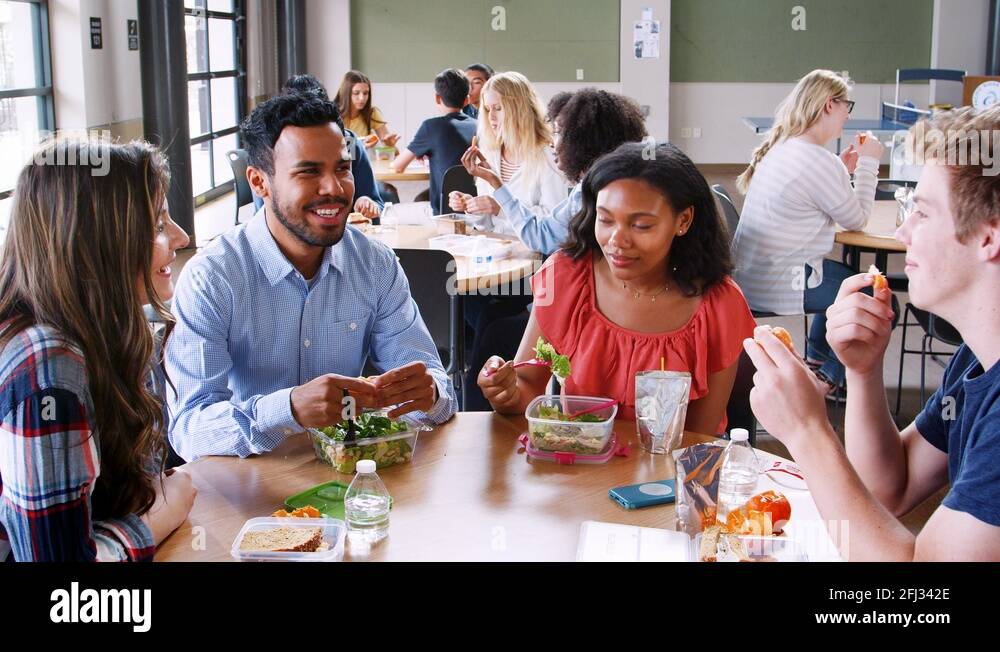 Students eating at the school cafeteria Stock Videos & Footage - HD and ...