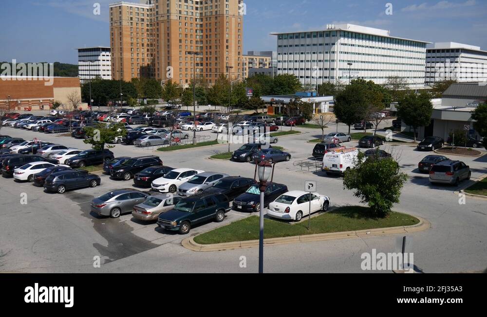A panoramic/wide view of a Target store parking lot, with cars pulling ...