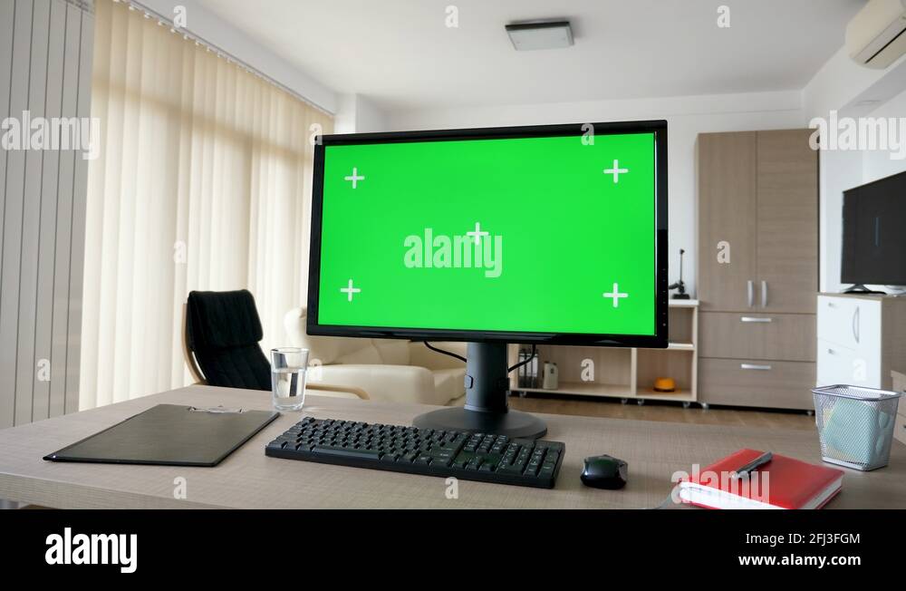 Dolly slider footage Personal PC computer with big green screen chroma ...