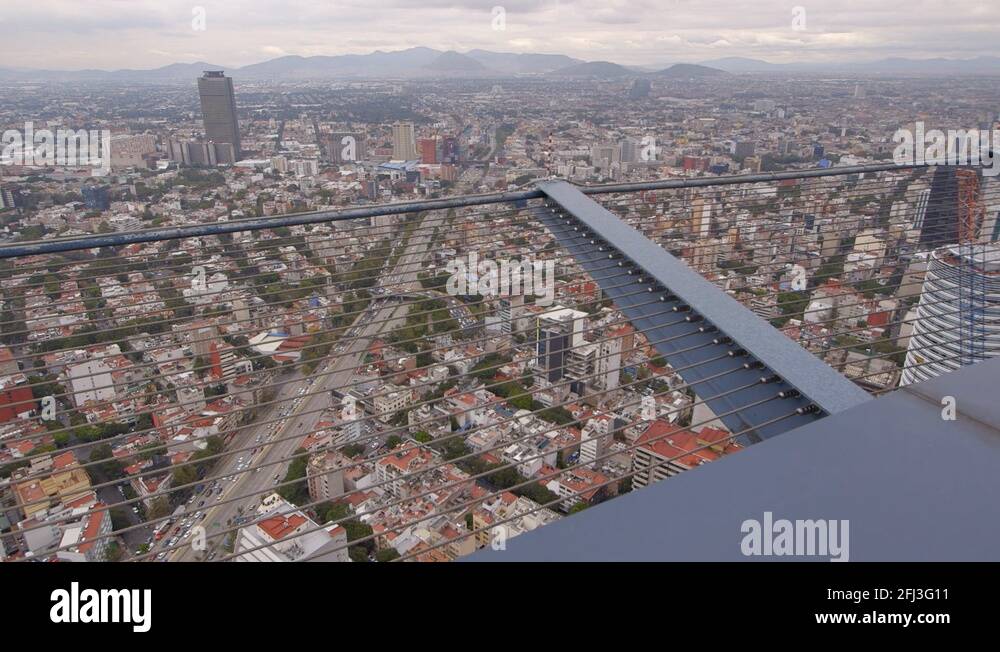 Wide aerial panning view of Mexico City from the top of a Skyscraper ...