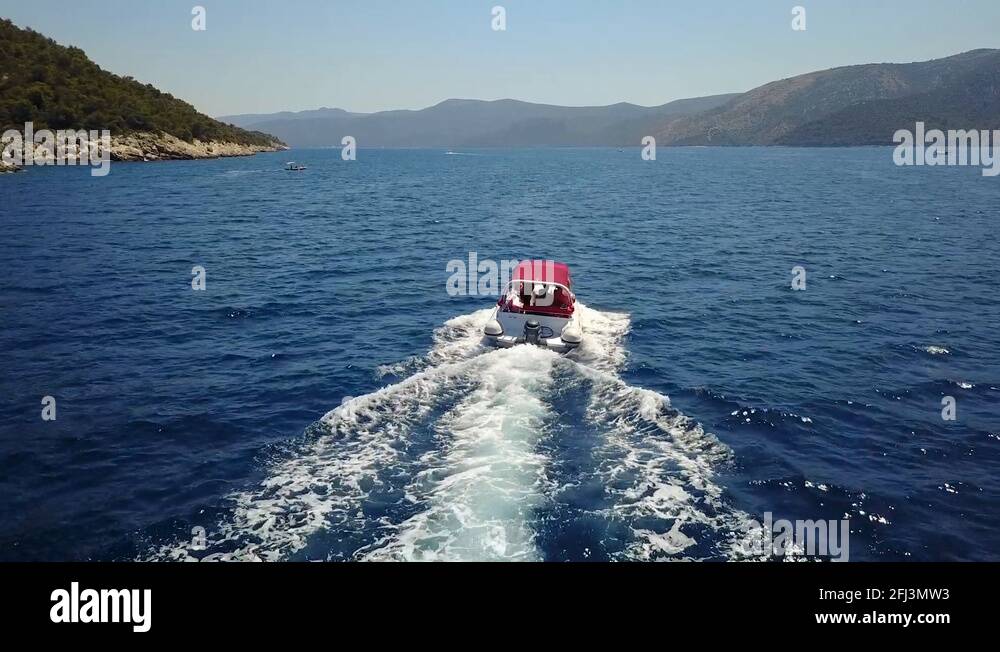 Drone footage of speedboat in Croatia between islands Stock Video ...