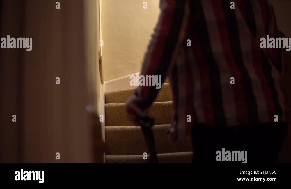 Domestic Child Abuse Concept With Father Walking Up Stairs With Belt ...