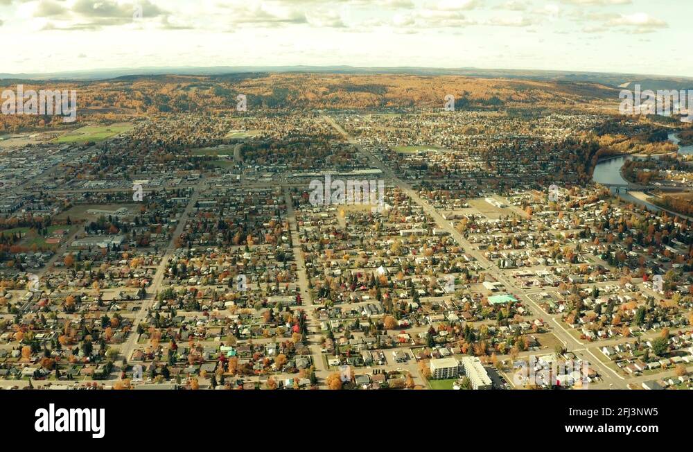 A cinematic, aerial view of the city of Prince George downtown area ...