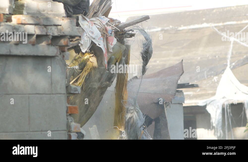 Demolition house using excavator in city. Rebuilding process Stock ...