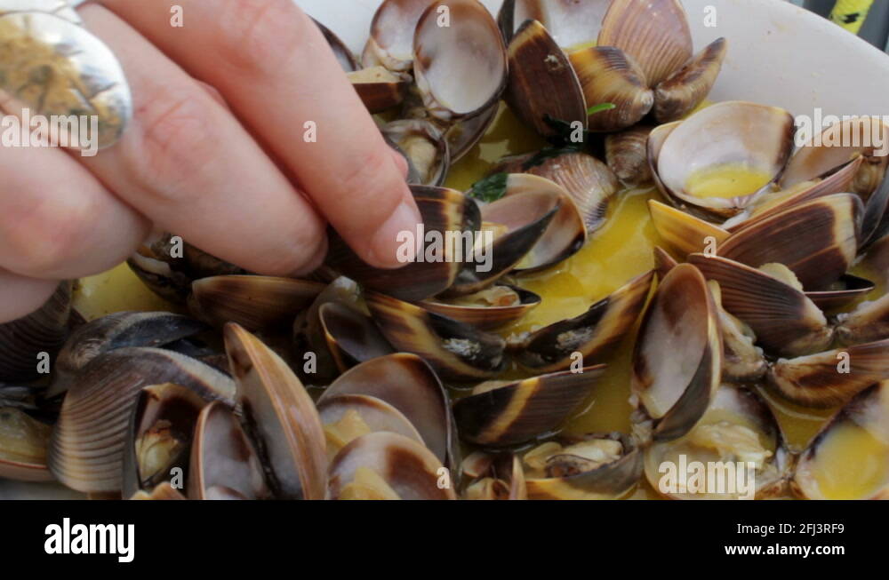 Eating clams Stock Videos & Footage - HD and 4K Video Clips - Alamy