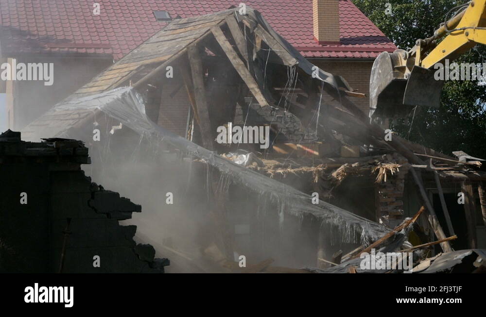 Demolition house using excavator in city. Rebuilding process Stock ...