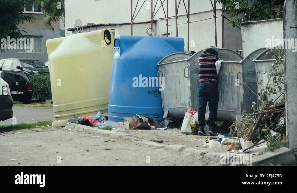 Looking through garbage Stock Videos & Footage - HD and 4K Video Clips ...