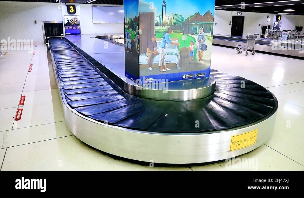 empty baggage carousel in airport hall at terminal 1c soekarno hattta ...