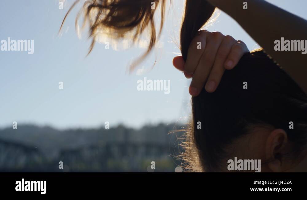 Woman pulling hair up Stock Videos & Footage - HD and 4K Video Clips ...