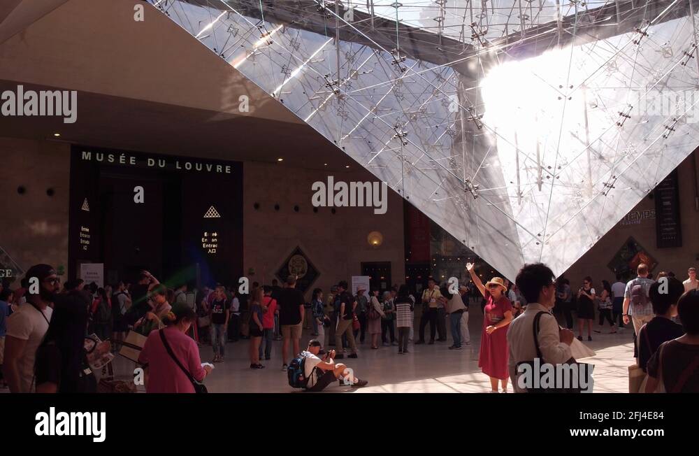 Guests visiting Louvre shopping center outside of museum 4k Stock Video ...