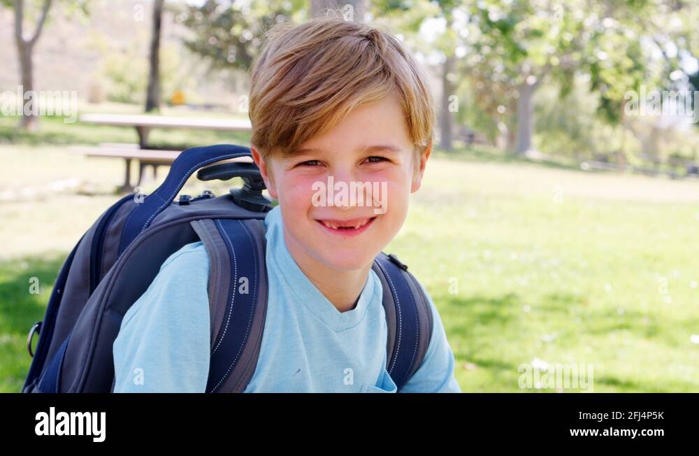 Portrait smiling boy backpack in Stock Videos & Footage - HD and 4K ...