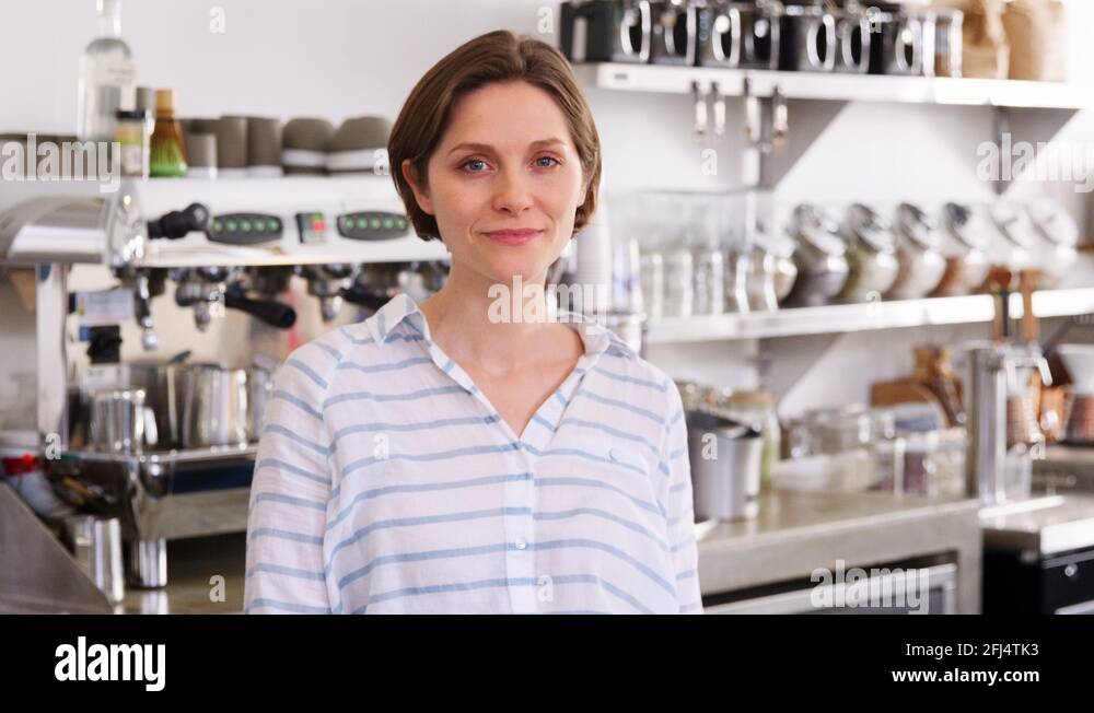 Young woman behind shop counter Stock Videos & Footage - HD and 4K ...