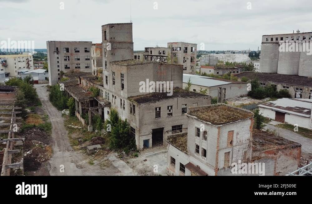 Abandoned ruined industrial factory building, ruins and demolition ...