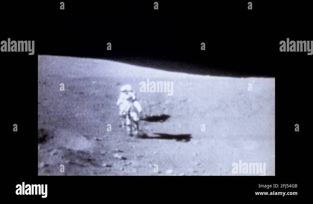 Astronauts return to Lunar Module after the sampling experiment - 1972 ...