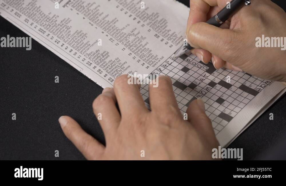 Writing crossword Puzzle with a pen 4k Stock Video Footage - Alamy