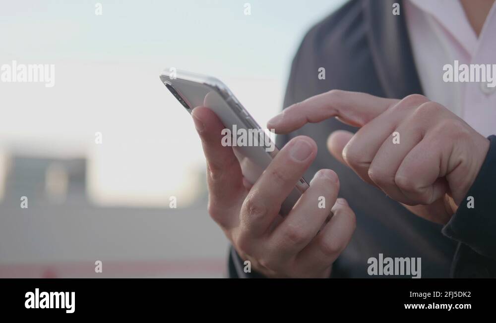 Phone hand close Stock Videos & Footage - HD and 4K Video Clips - Alamy