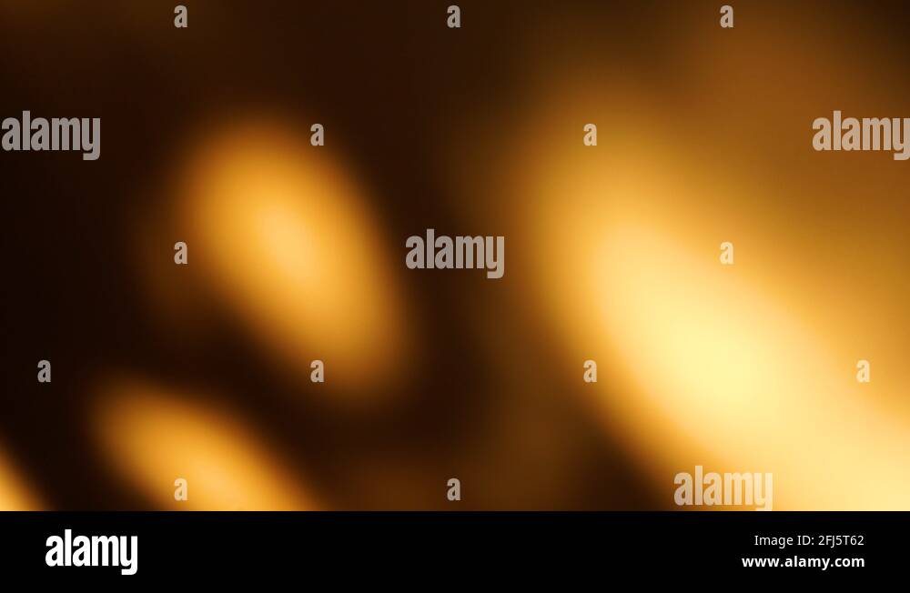 Brown dark background of messy shadows from sunlight through window ...