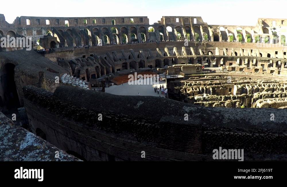 Roman Colosseum interior half in shade and half in sun Stock Video ...