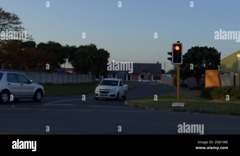 A traffic light changing from red to green in slow motion Stock Video ...
