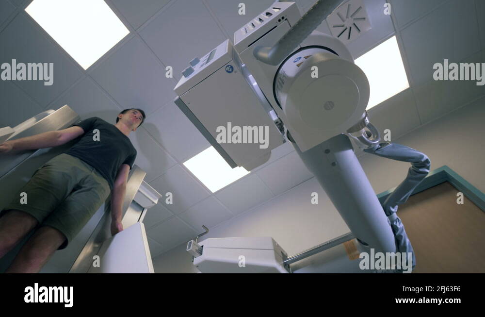 Process of medical x-ray scanning on a patient, bottom view Stock Video ...