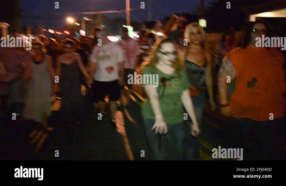 The annual zombie walk in Louisviile KY. People dress as zombies and ...