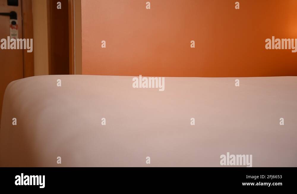 clean and neat bed in a hotel room or a bed room with double bed Stock ...