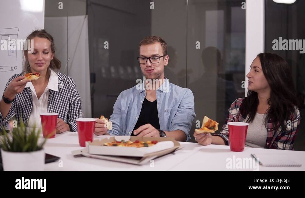 Lunch break eating Stock Videos & Footage - HD and 4K Video Clips - Alamy