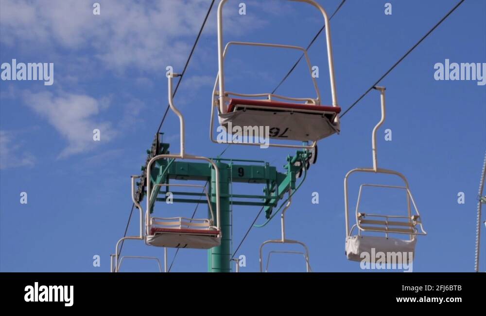 Empty air gondola seats chairs. Ski Lift carnival Ride, State fair ...
