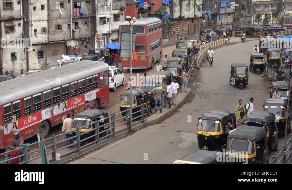Double decker buses, auto rickshaws and pedestrians in Mumbai, India ...