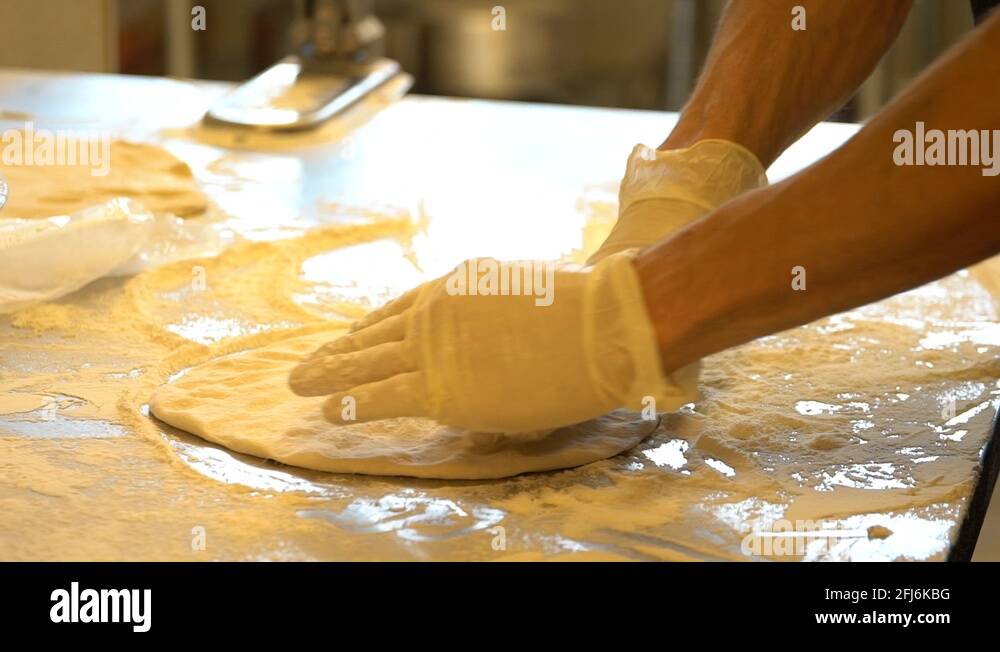 Tossing pizza Stock Videos & Footage - HD and 4K Video Clips - Alamy