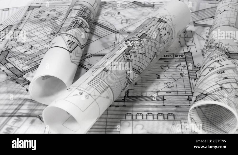 Blueprints - rolls of architectural drawings smoothly rotate Stock ...