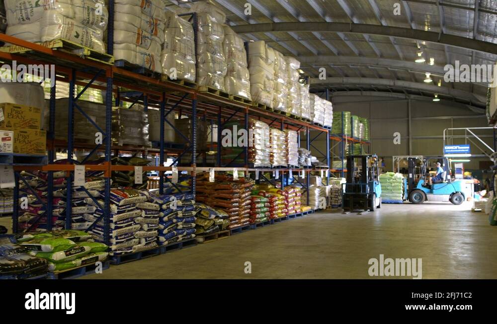 Forklift moving goods inside warehouse Stock Videos & Footage - HD and ...