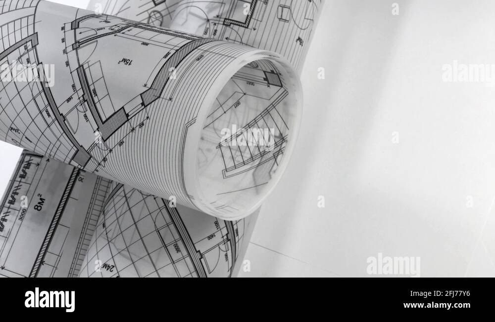 Blueprints - architectural drawings rolls smoothly rotate on the white ...