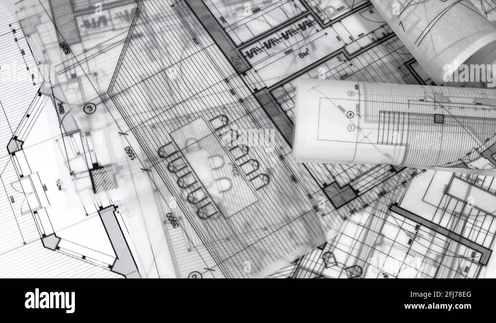 Blueprints - rolls of architectural drawings smoothly rotate Stock ...