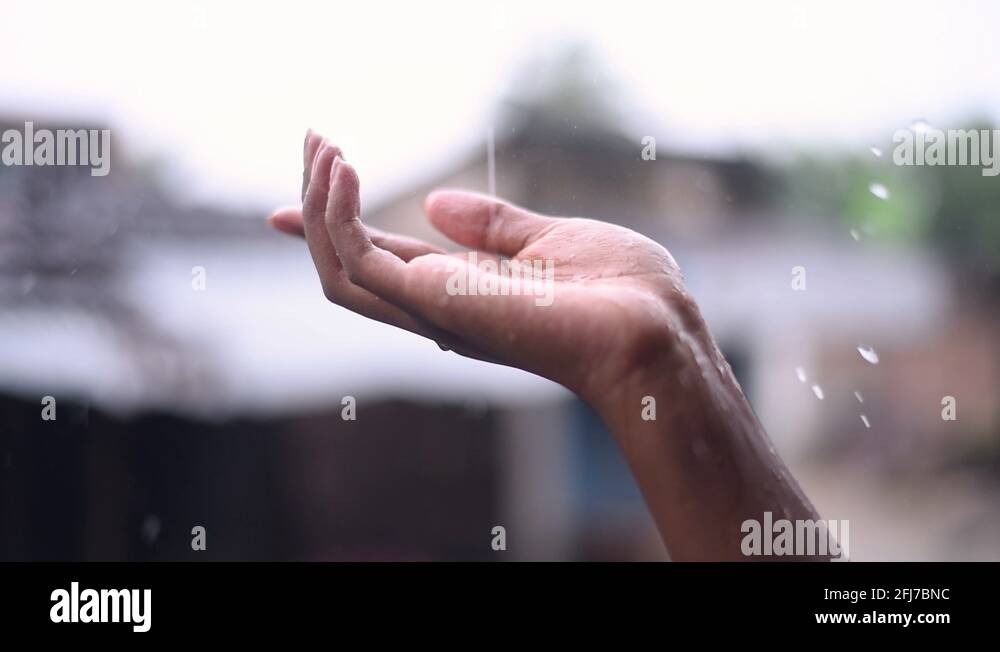 Girl catching rain Stock Videos & Footage - HD and 4K Video Clips - Alamy