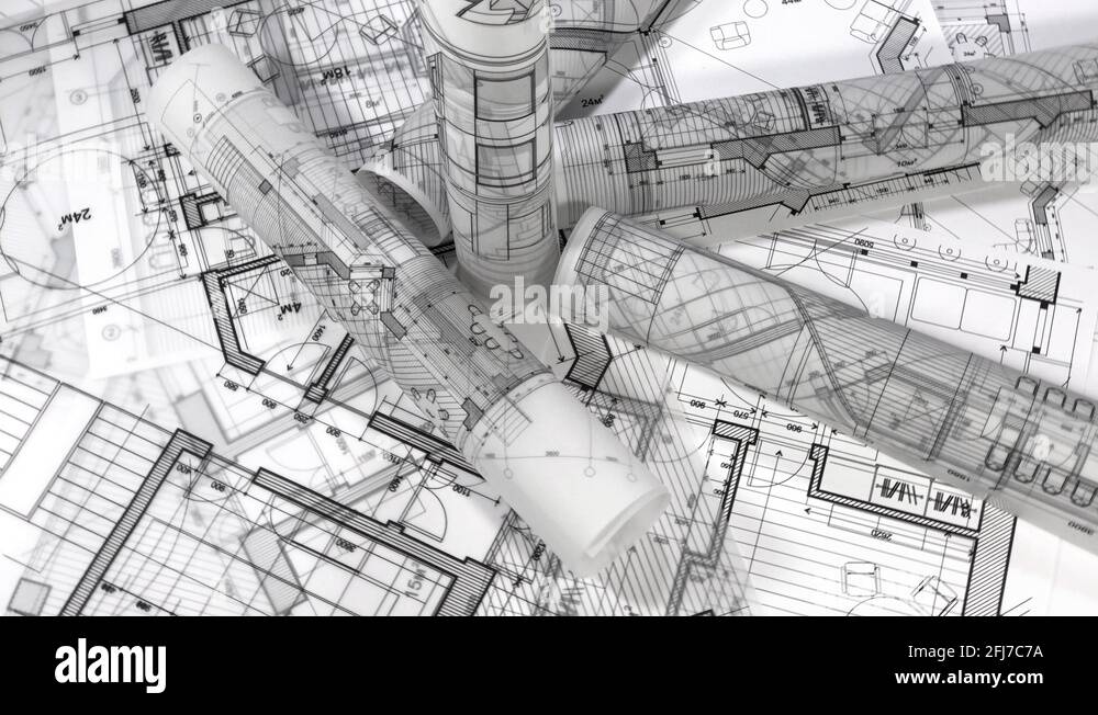 Blueprints - rolls of architectural drawings smoothly rotate Stock ...