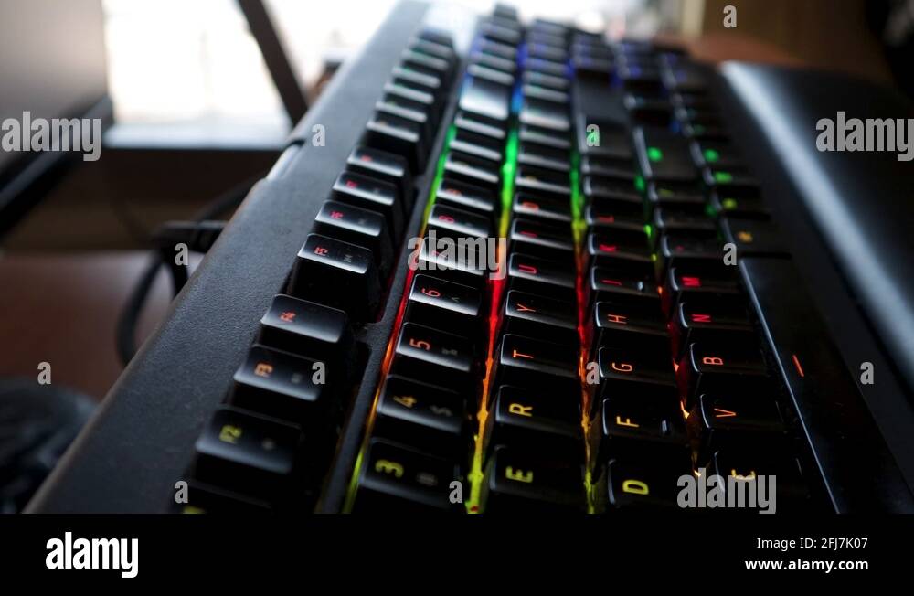 RGB keyboard lighting from left to right in a rainbow colored scheme ...
