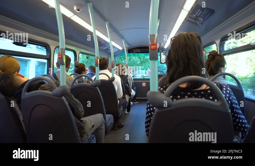 Inside of Driving Bus - People Sitting - London, UK - June, 2018 Stock ...