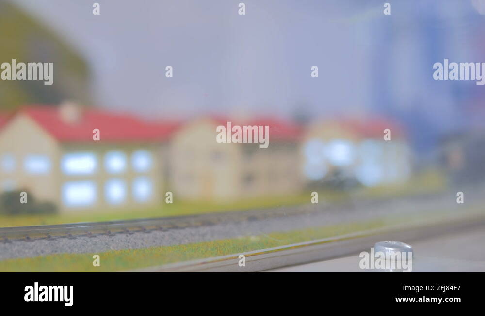 Toy hobby railroad layout with train and houses Stock Video Footage - Alamy