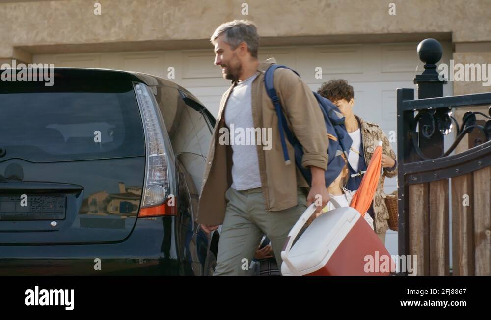 Family children packing car Stock Videos & Footage - HD and 4K Video ...