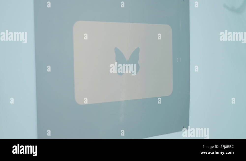 optical chart projector in eye clinic with background of digital chart ...