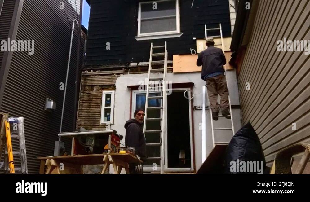 Working up ladders Stock Videos & Footage - HD and 4K Video Clips - Alamy