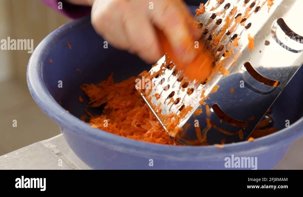 Grating carrots Stock Videos & Footage - HD and 4K Video Clips - Alamy
