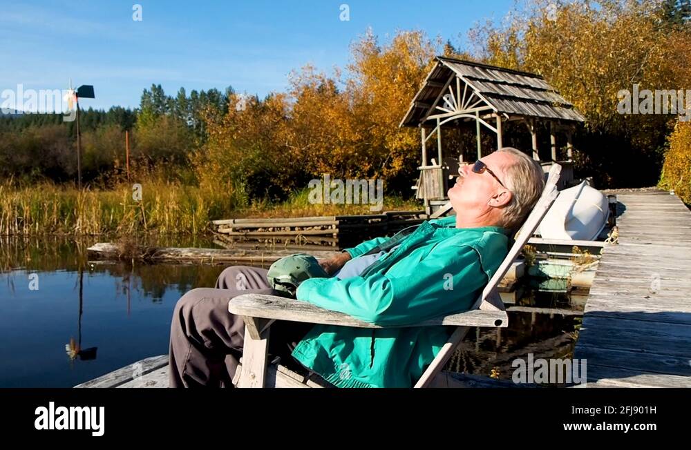 Man sitting on dock Stock Videos & Footage - HD and 4K Video Clips - Alamy